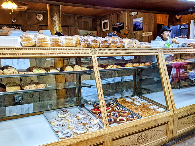 Pastry paradise awaits behind glass, tempting you to forget your diet and remember what joy tastes like.