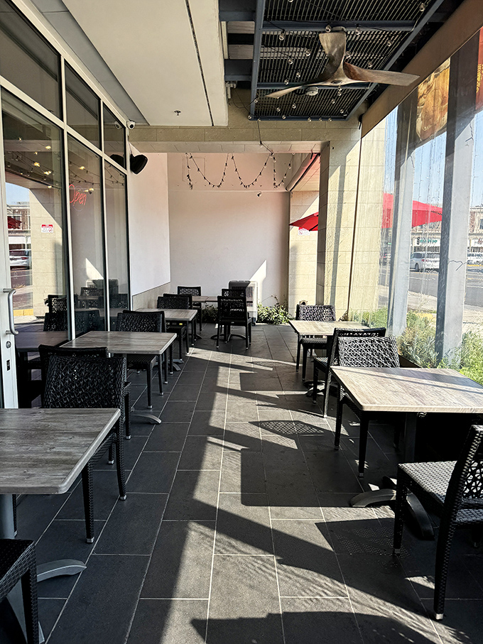 Sun-drenched patio seating that says "yes, you can enjoy Malaysian comfort food while getting your vitamin D quota for the day."