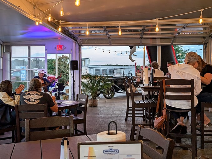 Evening patio seating with twinkling lights and live music&mdash;because seafood always tastes better with a soundtrack and a sunset. The perfect end to a Delaware day.