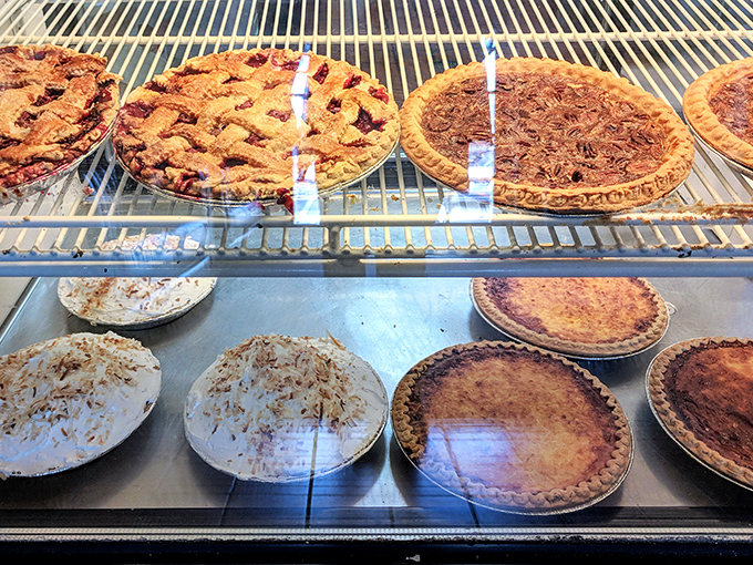 The pie case—Florida's version of the Louvre. Each perfectly latticed masterpiece represents decades of baking expertise and zero restraint when it comes to filling.