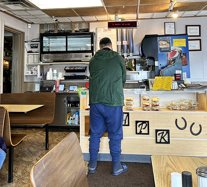 The counter where dreams are ordered and anticipation begins. Like waiting for concert tickets, but the payoff is much tastier.