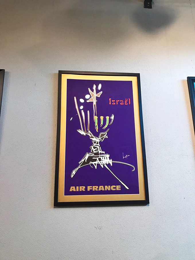 Vintage travel posters transport you to another era. This Air France advertisement for Israel combines mid-century graphic design with the romance of air travel.