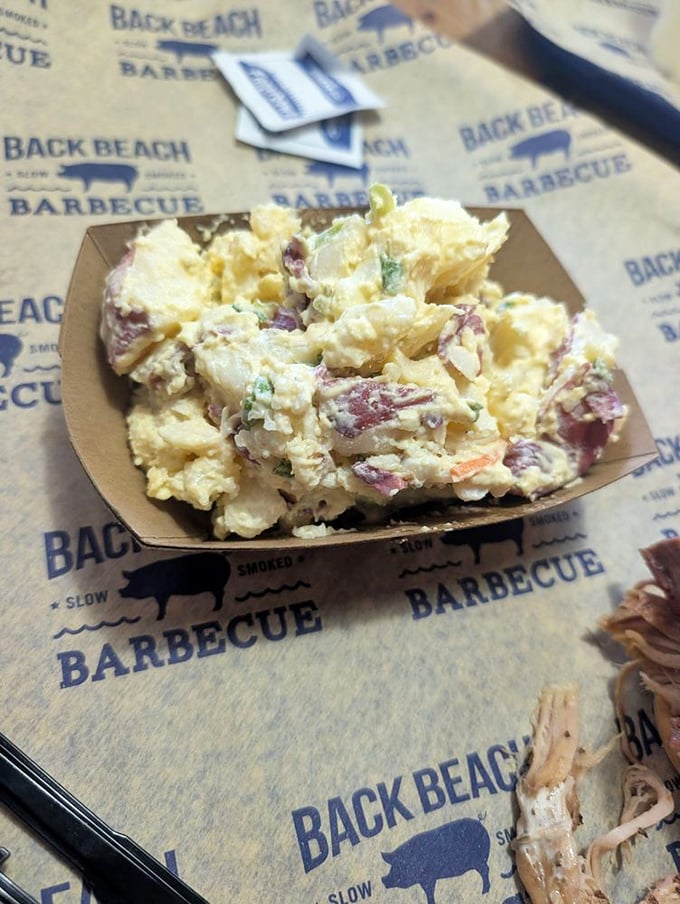 Potato salad that strikes the perfect balance between creamy and chunky, a side dish that refuses to be overshadowed by the main event.