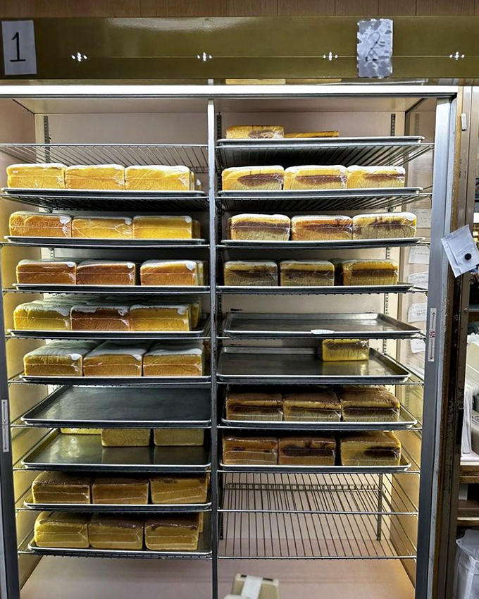 Behold the bread vault! Perfectly aligned pound cakes waiting to be claimed like gold bars at Fort Knox, but infinitely more delicious.