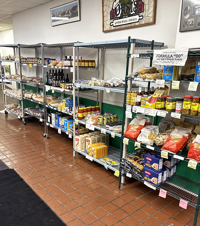 Shelves stocked with imported Italian goods that turn a simple pizza pickup into an accidental European shopping expedition.