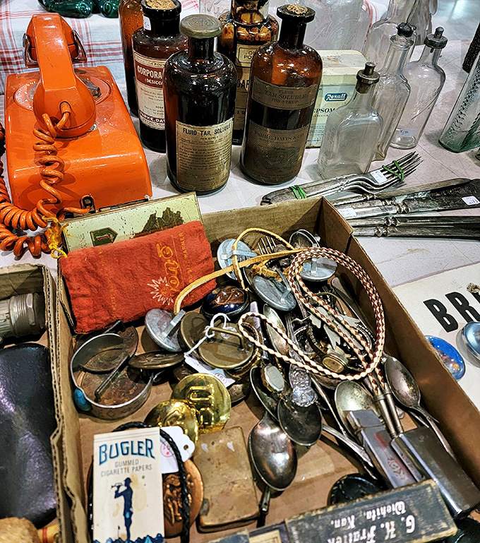 Vintage apothecary bottles and orange rotary phones—the Instagram-worthy artifacts of a pre-digital world that somehow feel revolutionary again.