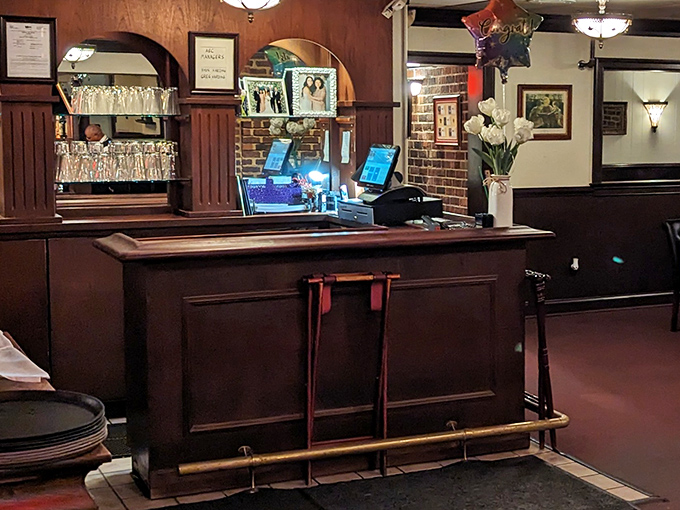 The host station—first checkpoint on your journey to culinary bliss. Many happy evenings have begun with the simple words, "Reservation for two."