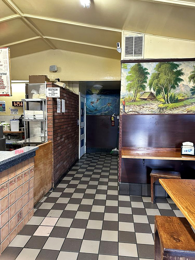 The hallway to happiness&mdash;where checkered floors lead to more delicious possibilities and maybe the restroom after all that salsa.