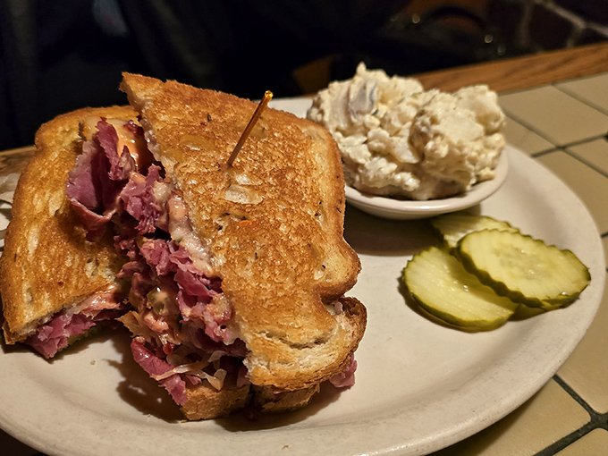 The Reuben sandwich&mdash;where corned beef, sauerkraut, and Swiss cheese perform a perfectly choreographed dance. Those pickle slices are the backup singers this sandwich deserves.