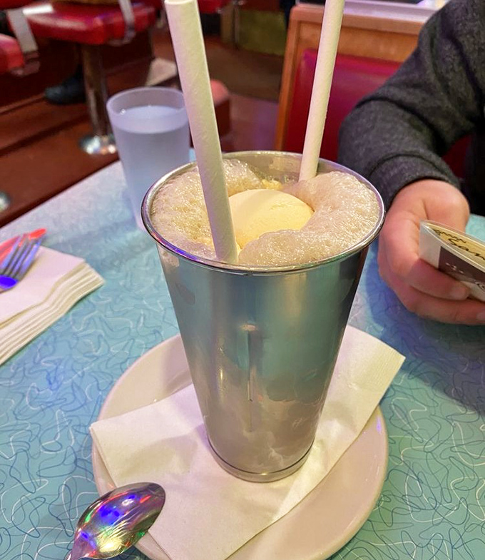 The root beer float&mdash;childhood nostalgia served in a frosty metal cup, complete with the impossible geometry of ice cream that refuses to sink. 