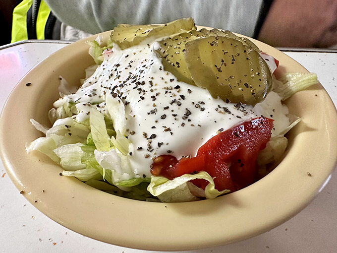 A simple side salad with ranch dressing proves that even at a temple of indulgence, there's room for a token nod to vegetation.
