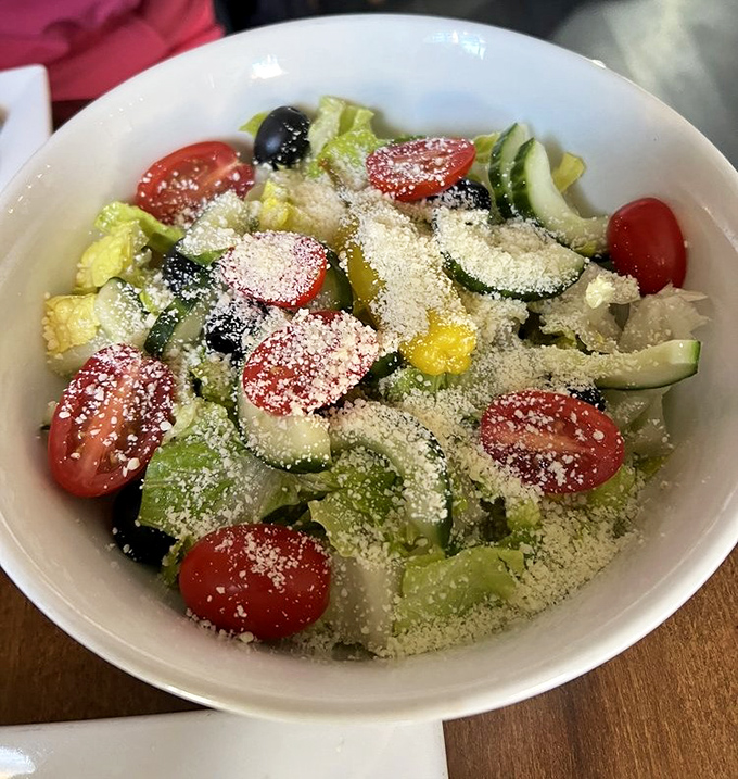 A salad that doesn't apologize for being a salad &ndash; fresh, vibrant, and dusted with enough parmesan to remind you you're still in an Italian restaurant.