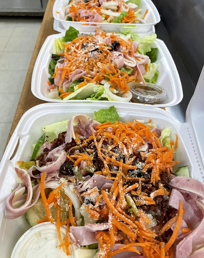 Fresh salads that don't feel like punishment. When the carrots are that vibrant and the ham is sliced that thin, eating healthy becomes suspiciously enjoyable.