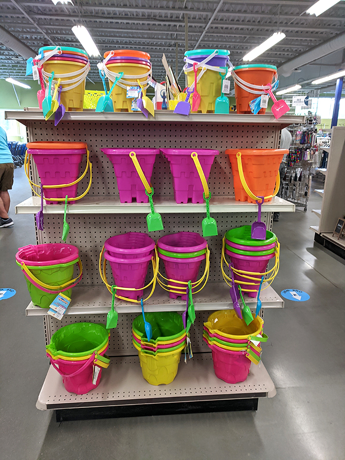 Summer dreams in plastic form: these vibrant beach buckets and shovels await their next sandcastle architect and seashore adventure.