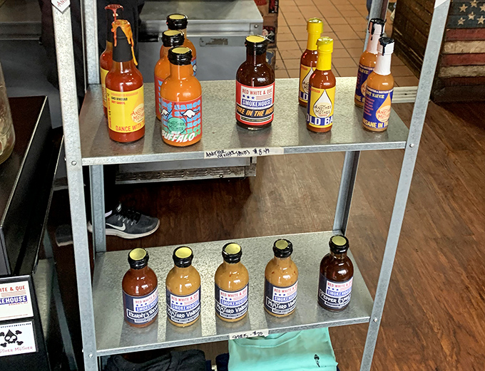 The sauce lineup &ndash; because sometimes you want options, even when the meat is perfect on its own. Each bottle holds liquid personality waiting to meet your brisket.