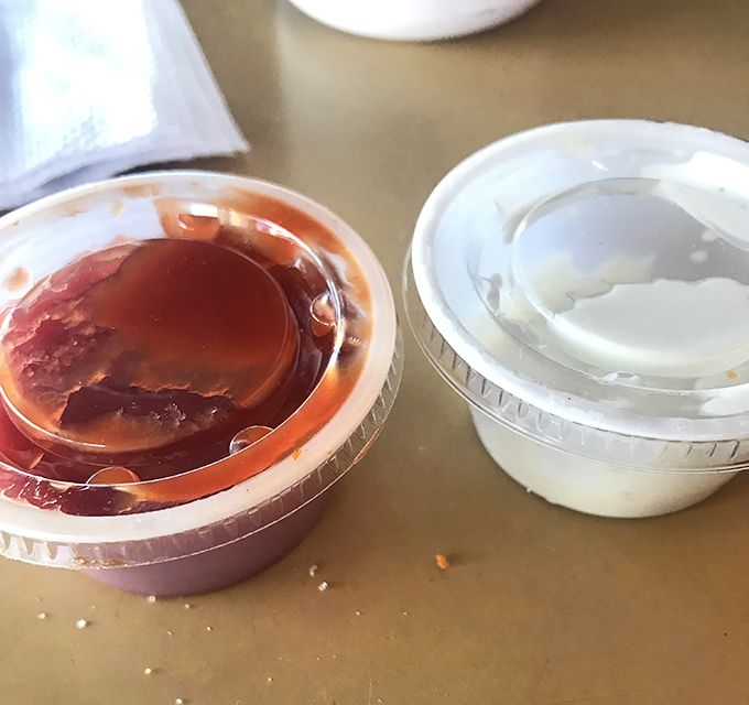 Condiment cups holding the secret supporting actors in your burger experience. Like good backup singers, they enhance without stealing the show.
