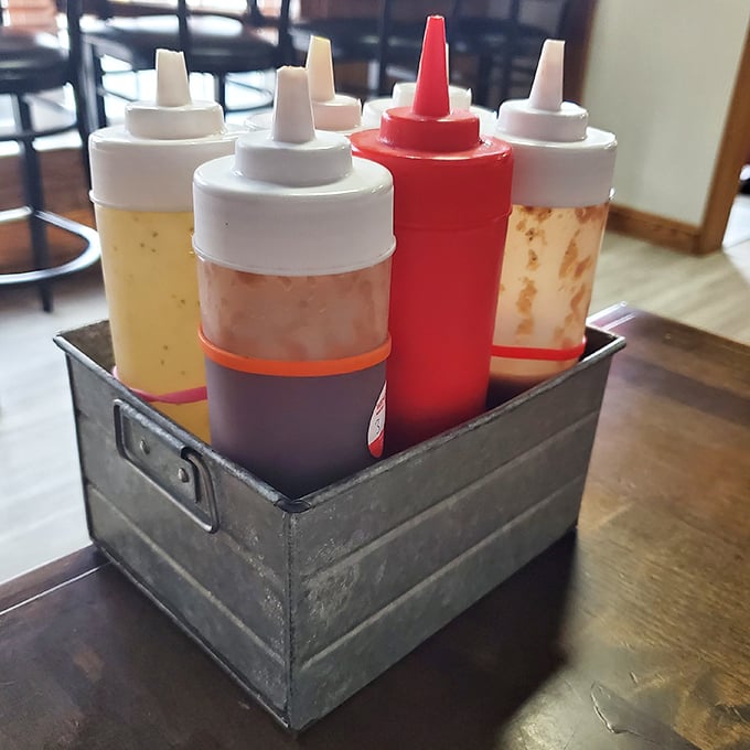These sauce bottles stand at attention like soldiers ready for duty &ndash; each one a different weapon in your flavor arsenal.