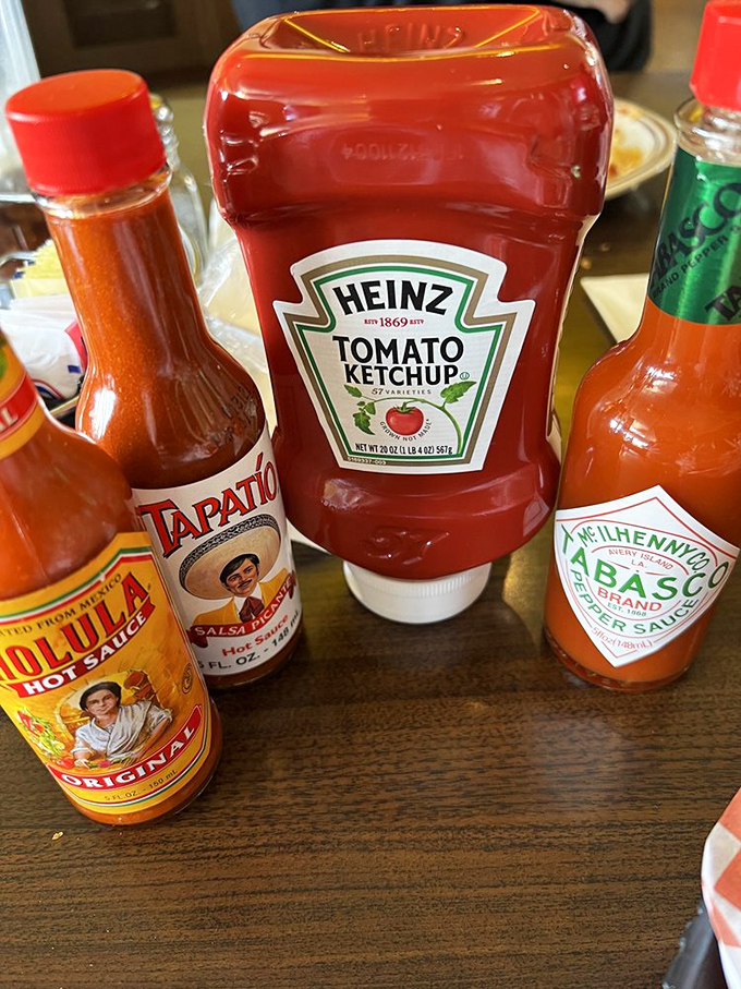 The condiment lineup&mdash;like the Avengers of flavor, each bottle ready to transform your meal from great to unforgettable.