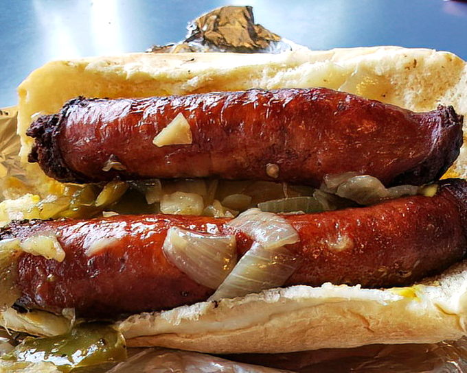 The sausage sandwich with peppers and onions &ndash; where smoke meets sweet in a handheld symphony that's worth setting your alarm for.