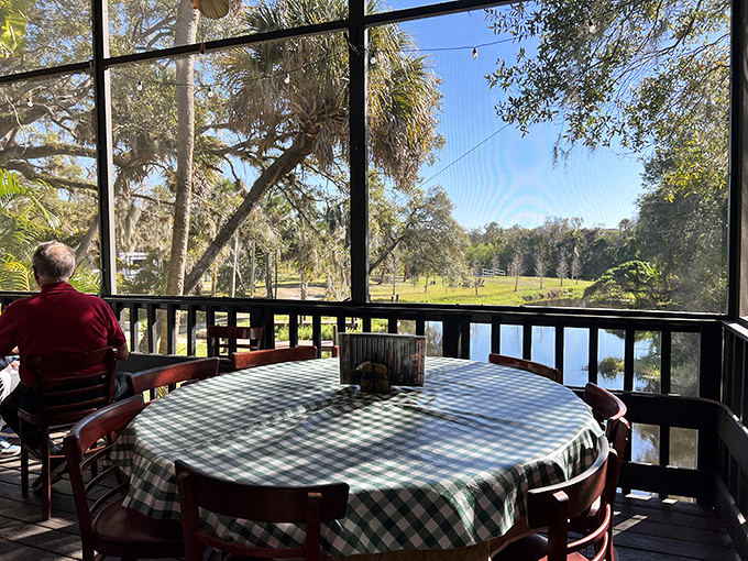 Riverside dining doesn't get more authentic than this screened porch. Oak trees draped with Spanish moss frame views of the Braden River&mdash;nature's dinner theater.