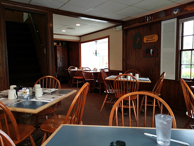 The dining room where breakfast dreams come true. Those wooden chairs have heard more satisfied "mmms" than a chocolate commercial.