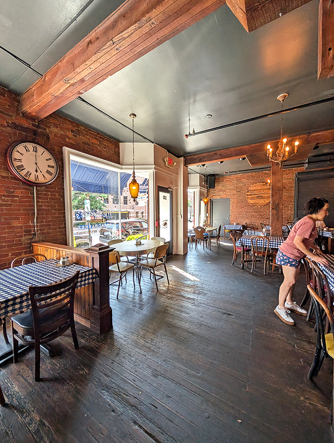 Sunlight streams through windows illuminating wooden floors that have supported generations of happy diners. History you can actually stand on.