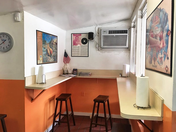 Indoor seating that says, "We care more about our food than our furniture." The vintage posters aren't decoration&mdash;they're time machines.