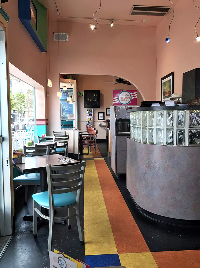 Sunlight streams through windows illuminating the path to breakfast nirvana. The colorful floor guides you like a delicious yellow brick road.