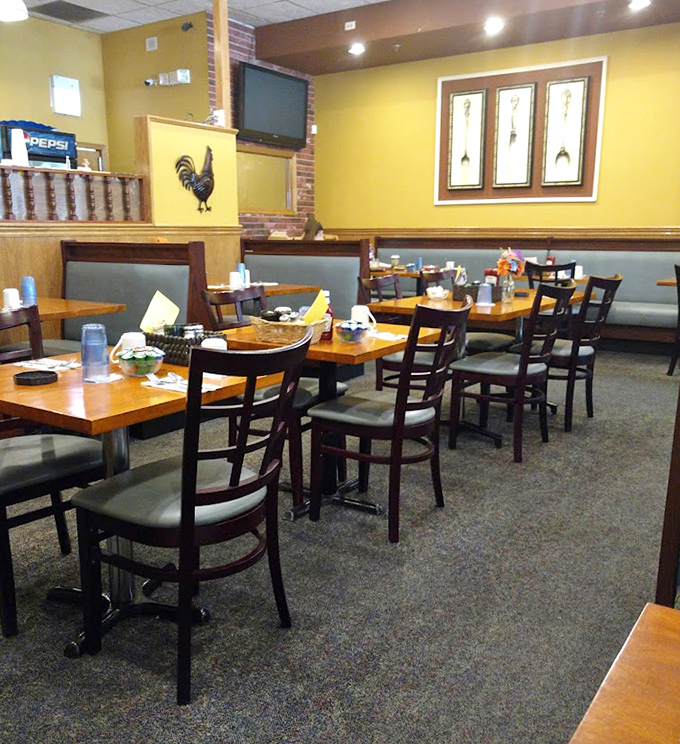 Yellow walls and comfortable booths create the perfect backdrop for the morning's most important negotiations: who gets the last bite.