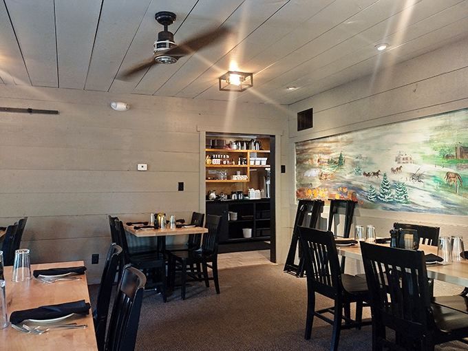 Multiple dining spaces include both carpet and hardwood areas, plus that brick fireplace adding warmth to cold Indiana evenings perfectly.