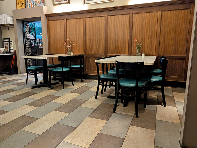 Simple tables await their next guests. No pretension here&mdash;just honest furniture that's supported countless elbows and witnessed innumerable "mmms" of satisfaction.