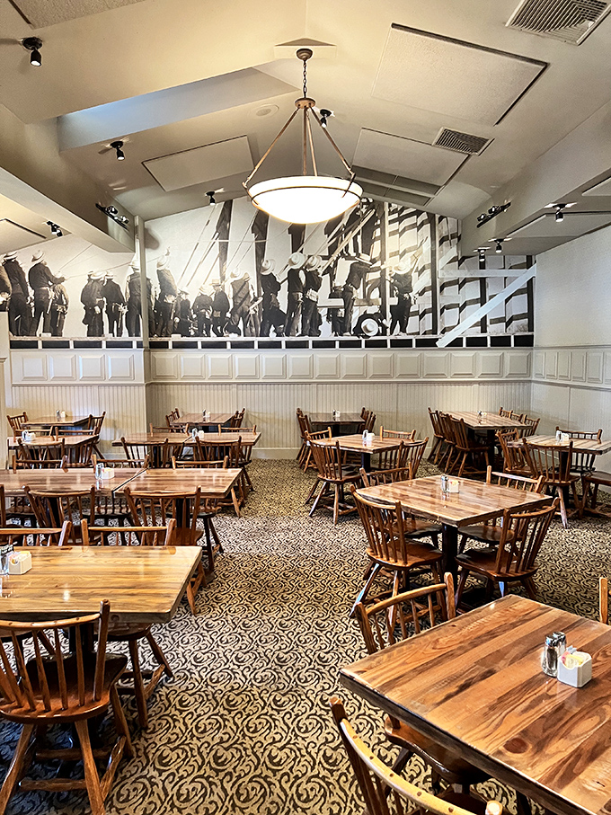 Empty tables waiting for the lunch rush like blank canvases before a masterpiece. Soon they'll host the symphony of forks meeting plates.