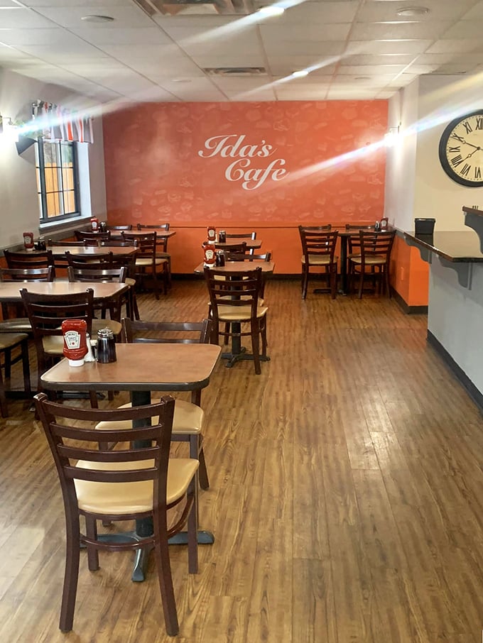 The dining area's clean lines and warm wood tones create an atmosphere where lingering over that last cup of coffee feels not just allowed, but encouraged.