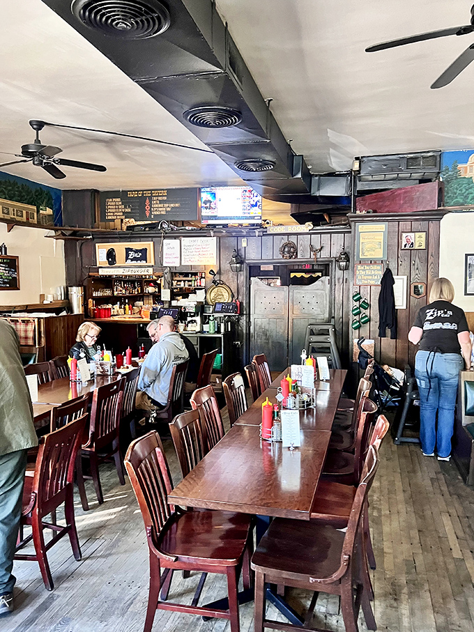 Long wooden tables invite communal dining, where strangers become friends over shared stories and the mutual appreciation of a perfect burger.