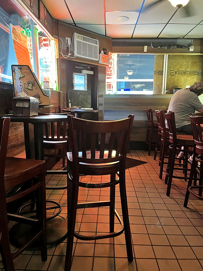 Simple wooden chairs and tables&mdash;because when the food is this good, you don't need fancy furniture distracting from the main event.