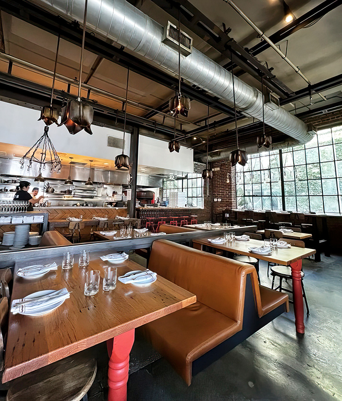 High ceilings and exposed infrastructure create a space that breathes with possibility&mdash;like dining in a cathedral dedicated to culinary creativity.