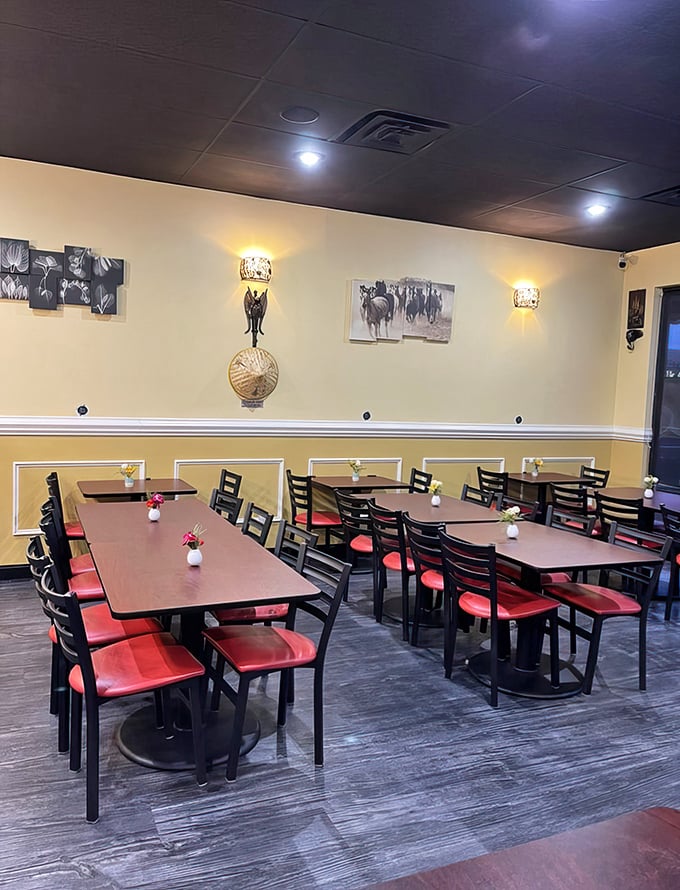 Spacious seating and thoughtful decor including wall art create an atmosphere where lingering over your meal feels perfectly natural and encouraged.