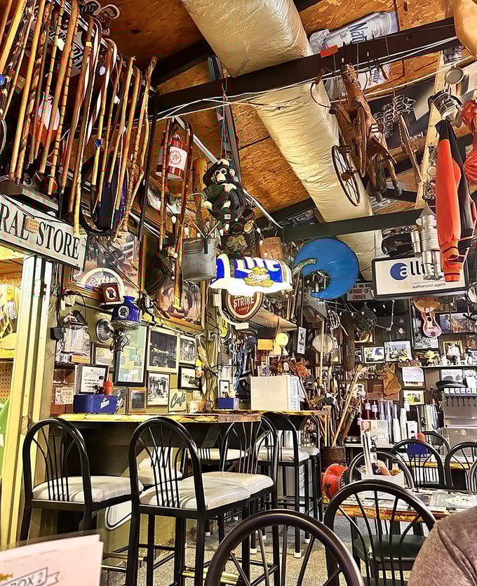 Simple tables and chairs that don't distract from what matters—the food and the floor-to-ceiling shrine to all things aquatic.