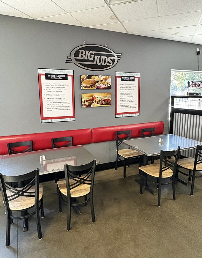 Red booths and metal tables await the next round of diners like front-row seats to the greatest show on plates.