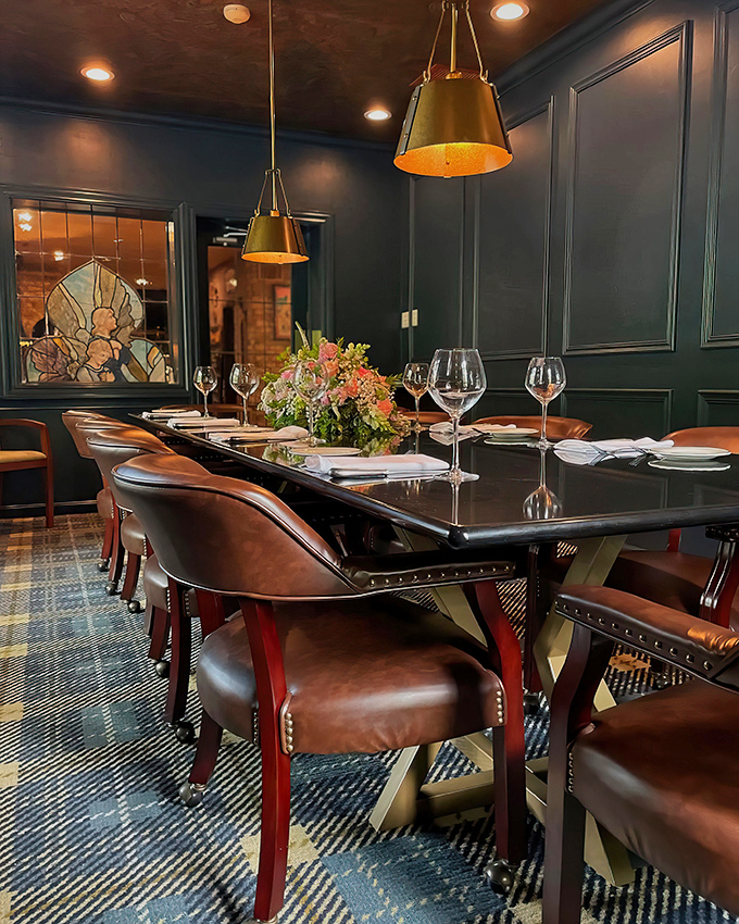 Modern elegance meets timeless comfort in this private dining space. Those brass pendant lights have illuminated countless special occasions.
