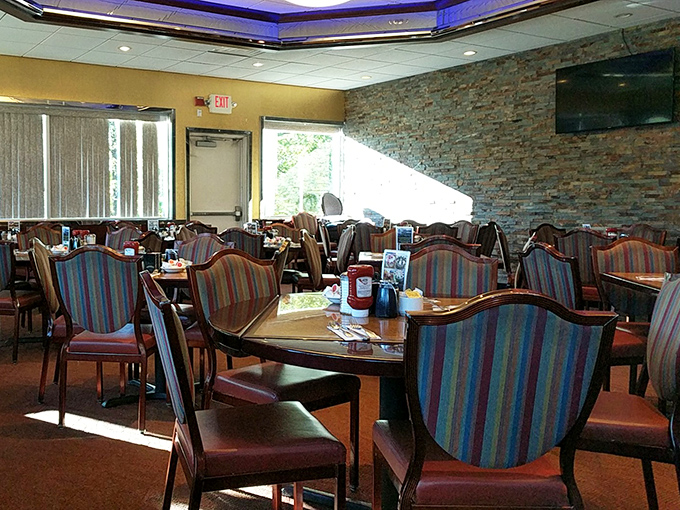 A dining area where chairs aren't just furniture but thrones for everyday royalty coming to feast on comfort food classics.