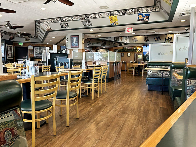 Empty tables waiting for the breakfast rush like actors before curtain call. Soon they'll be the stage for pancake performances and coffee soliloquies.
