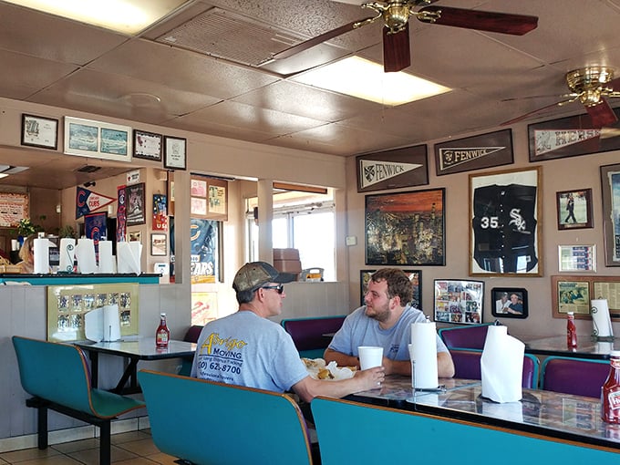 Conversations flow as easily as the iced tea refills in this cozy corner. The teal and purple booths have witnessed countless first dates and family gatherings.