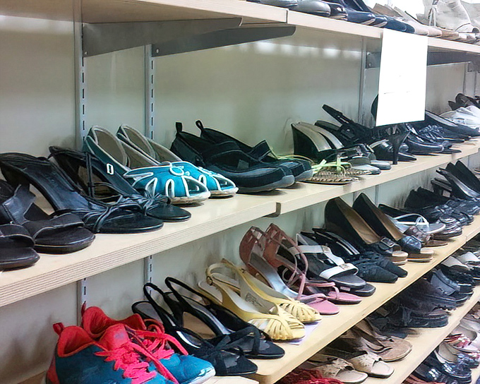 The shoe section: where practical flats mingle with statement heels in a footwear social club that welcomes every style and decade.