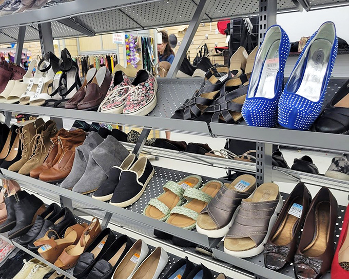 Shoe paradise where stilettos neighbor sneakers in peaceful retail harmony. Those blue studded platforms are calling someone's name!