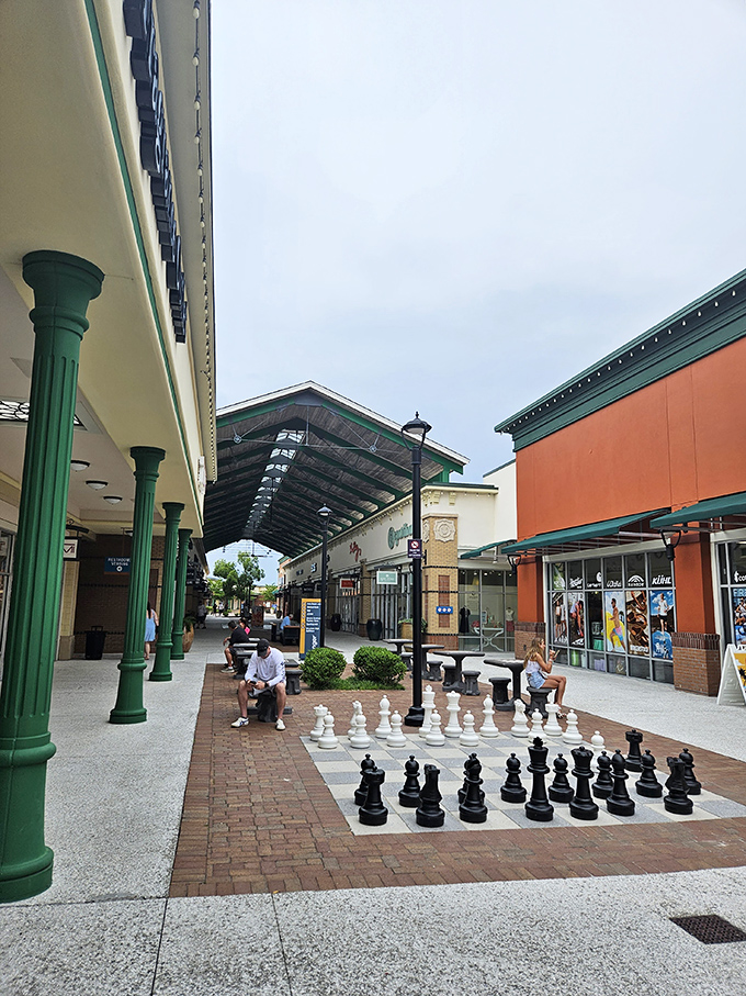 The oversized chess set offers strategic entertainment between shopping sprees, or metaphorical training for your next credit card statement battle.