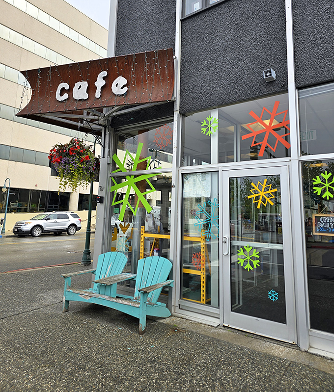 The side entrance features turquoise Adirondack chairs that say "stay awhile" even before you've made it through the door adorned with colorful snowflake decals.
