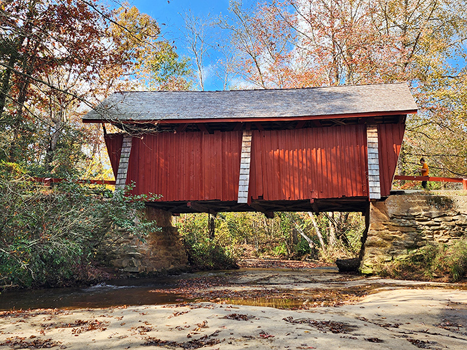 Fall foliage creates a perfect frame for the bridge's classic profile &ndash; a scene worthy of the most nostalgic autumn postcard.