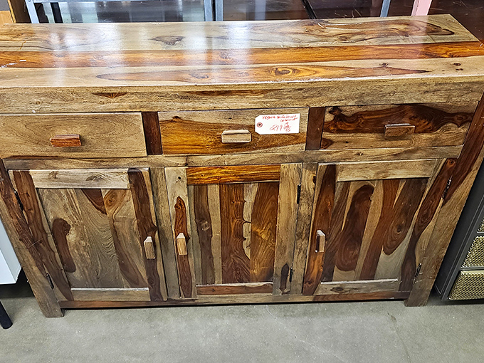 This isn't just a sideboard&mdash;it's a masterclass in woodworking, with grain patterns more captivating than most streaming shows. 
