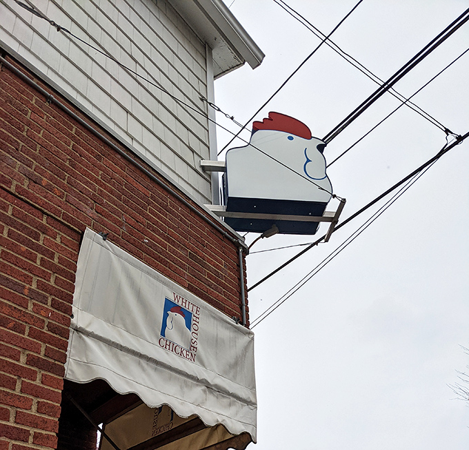 The rooster sign stands guard above the entrance, a sentinel of quality that's been clucking "come on in" to hungry Ohioans for generations.
